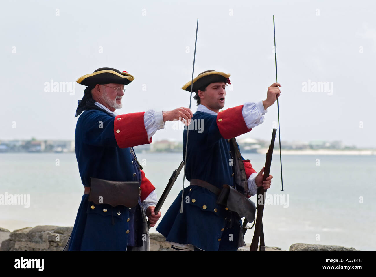 Reenactors prepare to fire flintlock rifles, St. Augustine, Florida ...