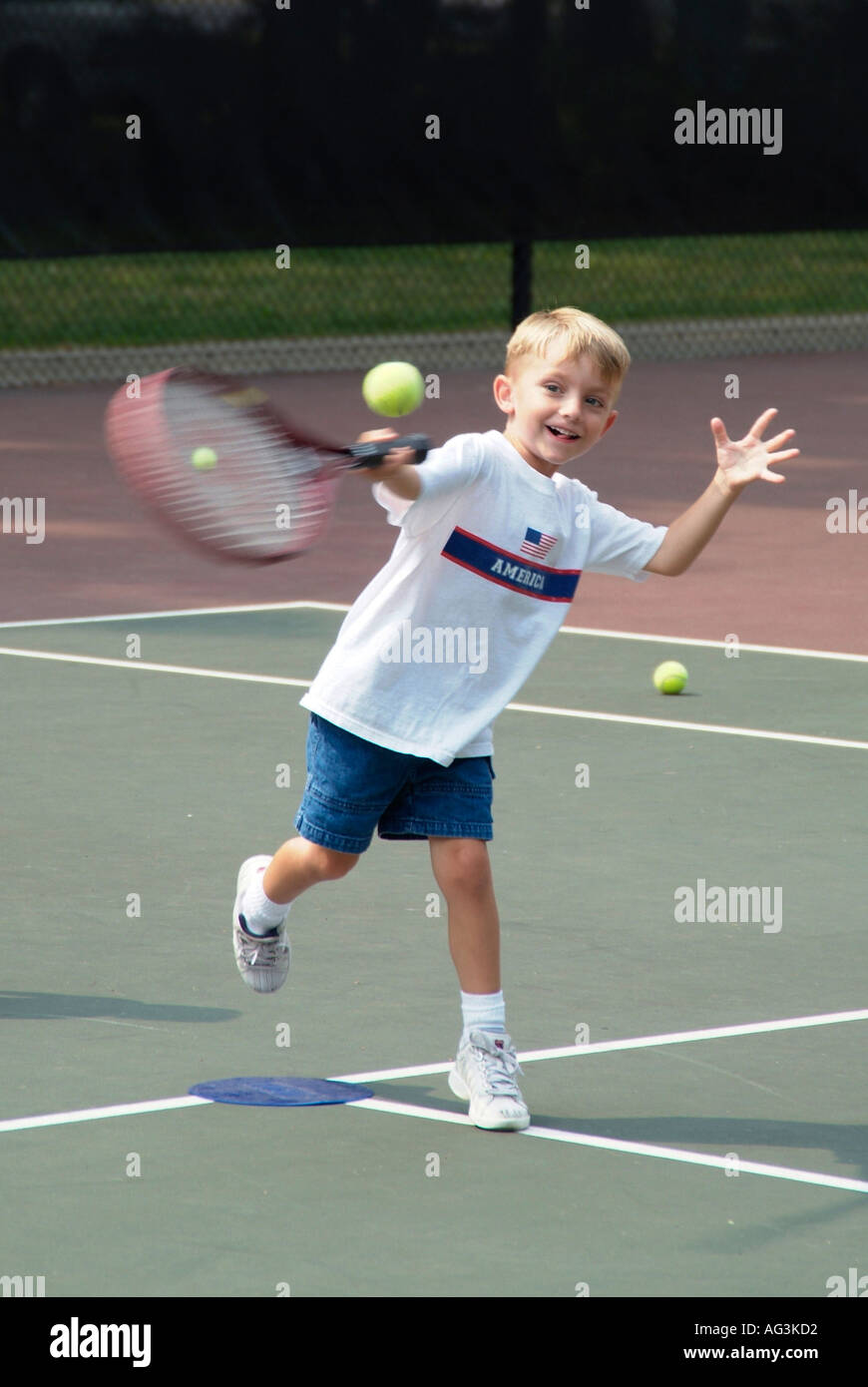 Tennis lesson and children hi-res stock photography and images - Alamy