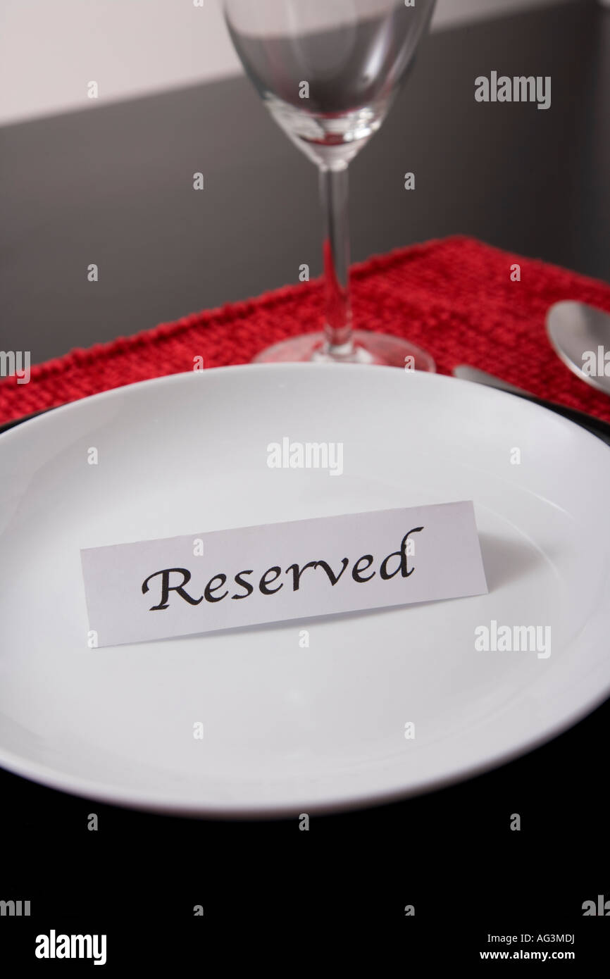 Reserved place setting Stock Photo - Alamy