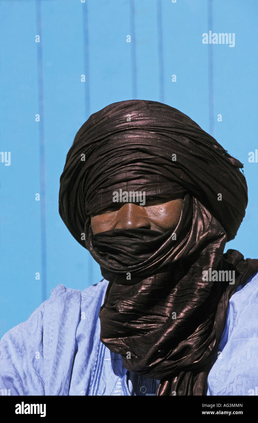 Algeria Tamanrasset Man of Tuareg tribe wearing turban during TAFSIT or ...