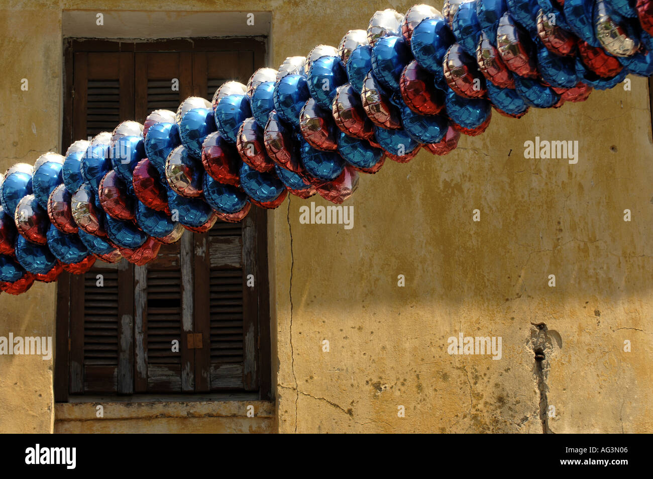 agrinon greece house housing balloons celebration red blue Stock Photo ...