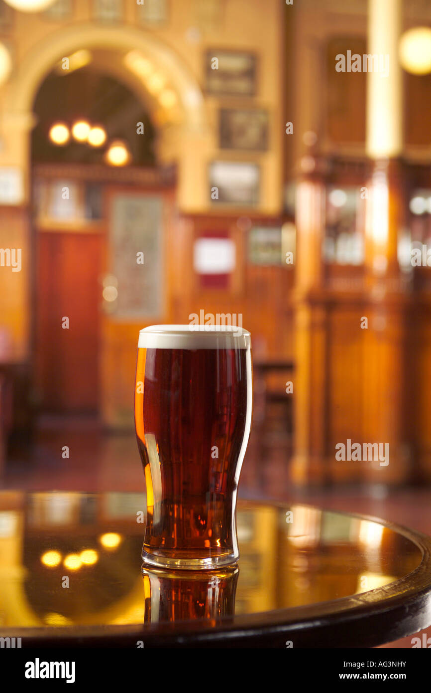 Pint of Beer on Table in Pub Stock Photo - Alamy