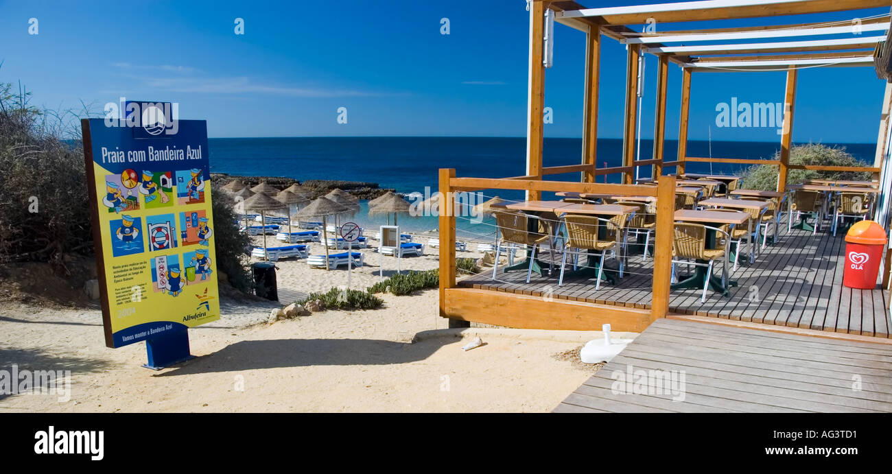 Blue flag beach sign next to a beach cafe at Gale near Albufeira ...