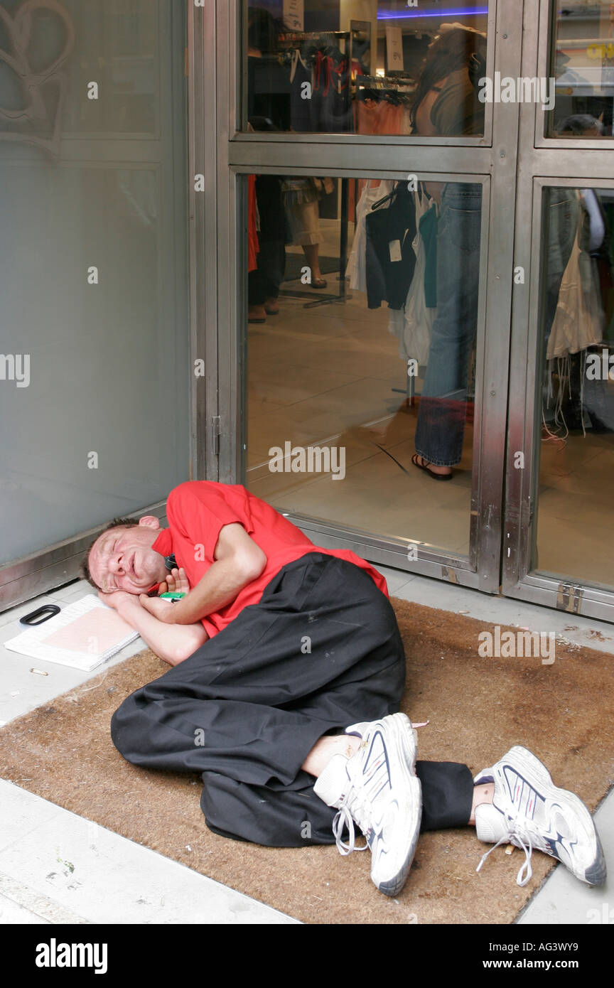 Shop front drug addict Stock Photo - Alamy
