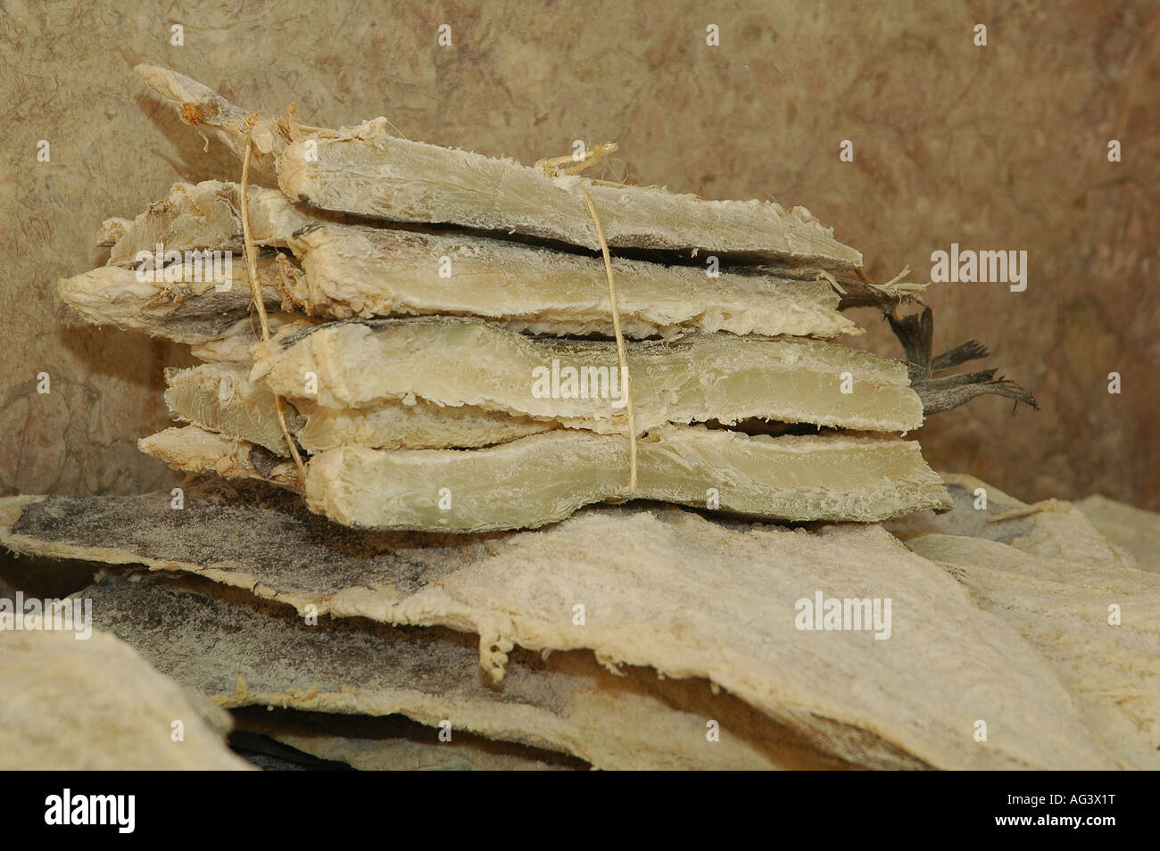 Pile of salted and dried cod Bacalhau fishes in Portugal Stock Photo ...