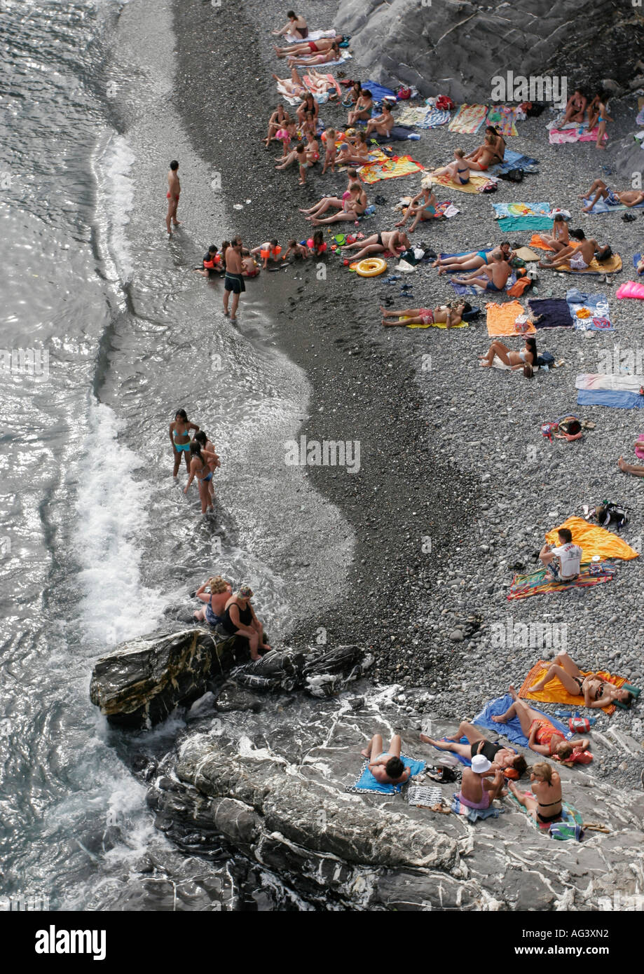 Italian Riviera Sunbathers Stock Photo - Alamy
