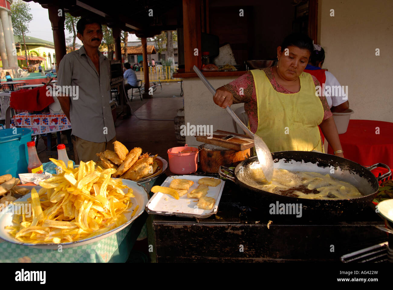 Lady frying plantain Masaya Nicaragua Stock Photo - Alamy