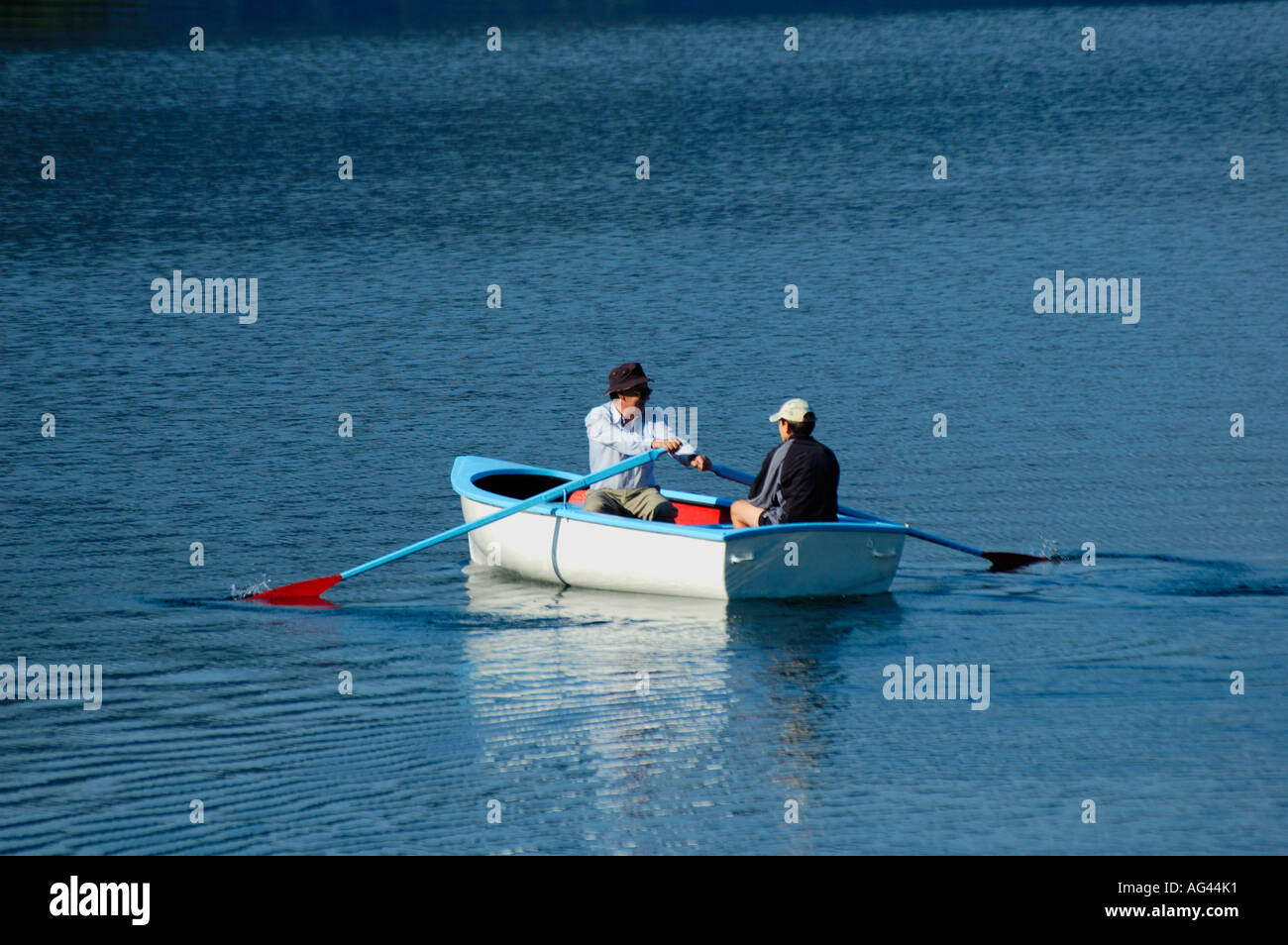Family rowing boat fishing hi-res stock photography and images - Alamy