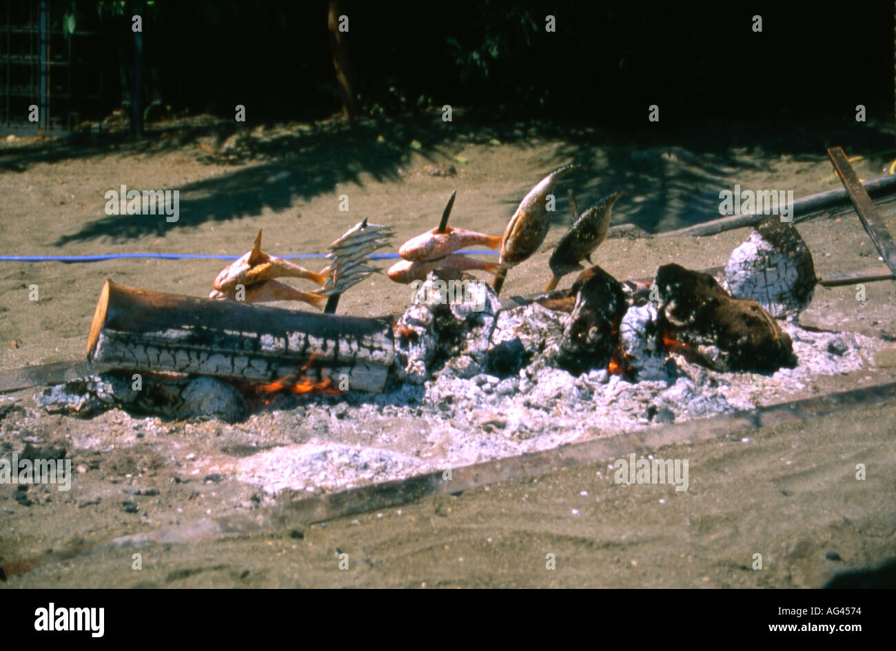 fresh fish cooking on beach Marbella Stock Photo - Alamy
