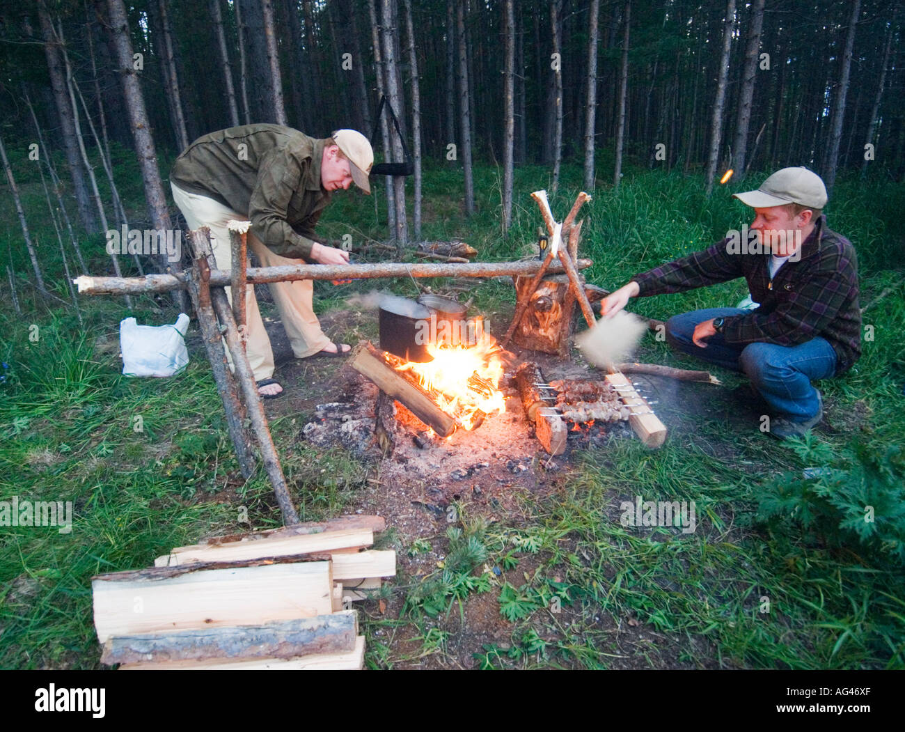 Cooking on a campfire in Zaibaikal National Park beside Lake Baikal in ...