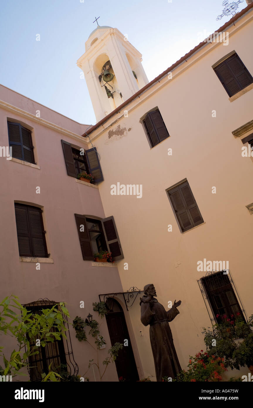 Churchyard with statue of Saint Francis of Assisi in Chania, Crete ...