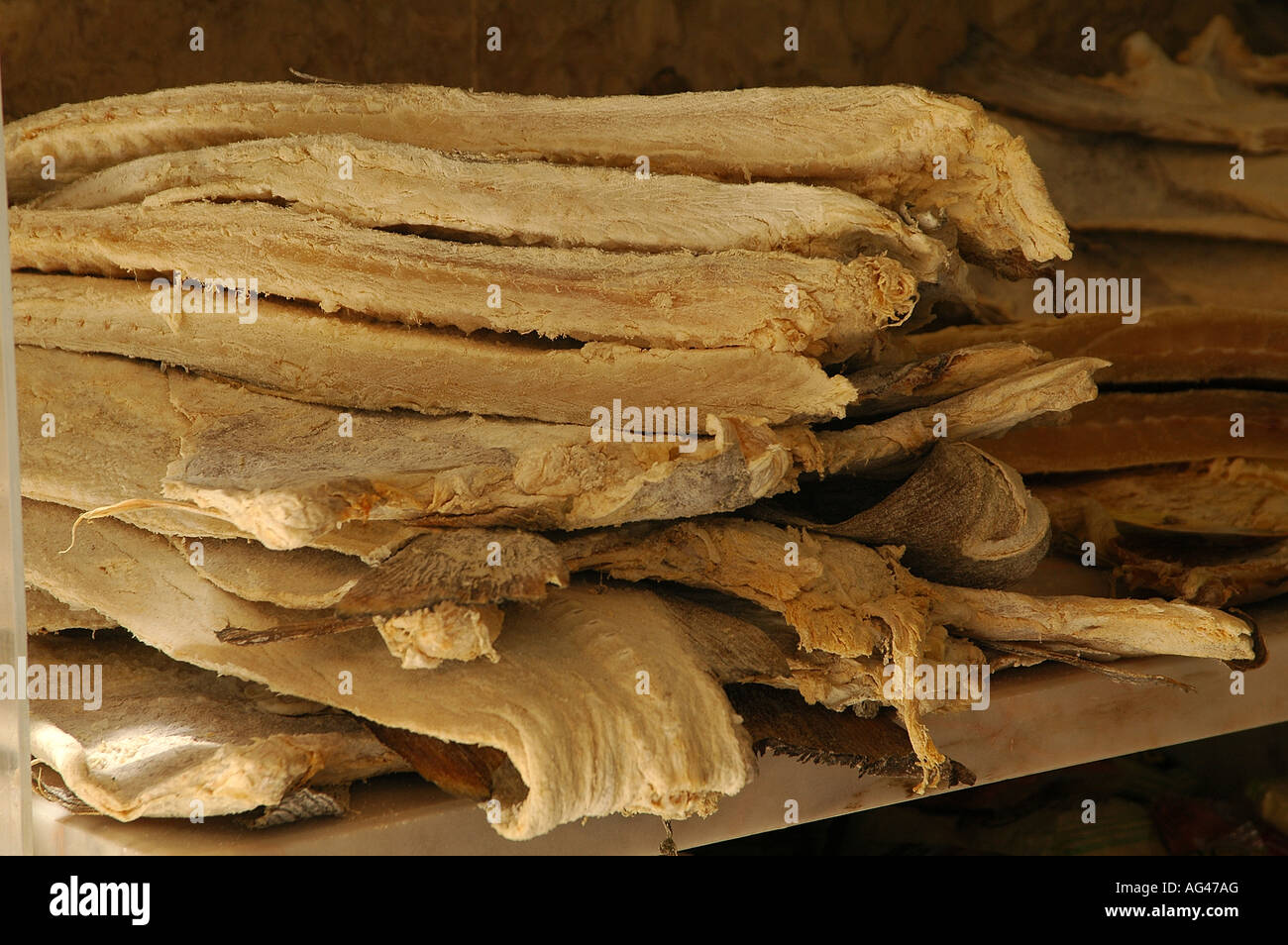 Pile of salted and dried cod Bacalhau fishes in Portugal Stock Photo ...
