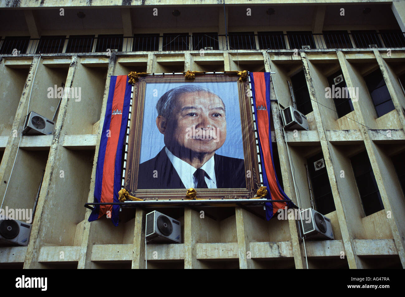 A portrait of Cambodian King Norodom Sihanouk on a Phnom Pehn Building ...