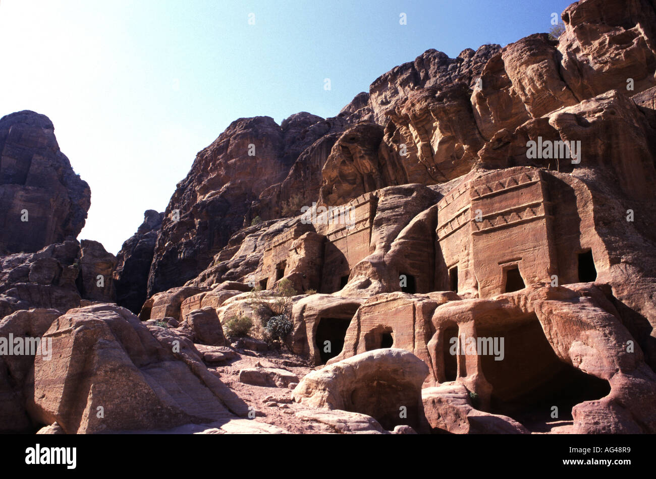 Tombs carved into the the red sandstone cliffs of Petra Jordan Stock ...