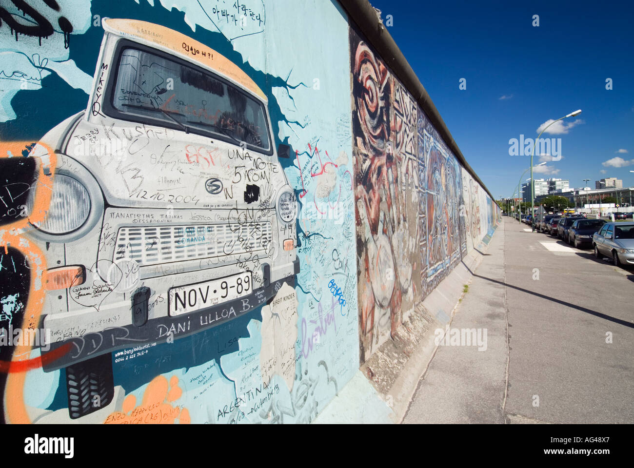 Colourful murals painted on Berlin Wall at East Side Gallery in Berlin ...