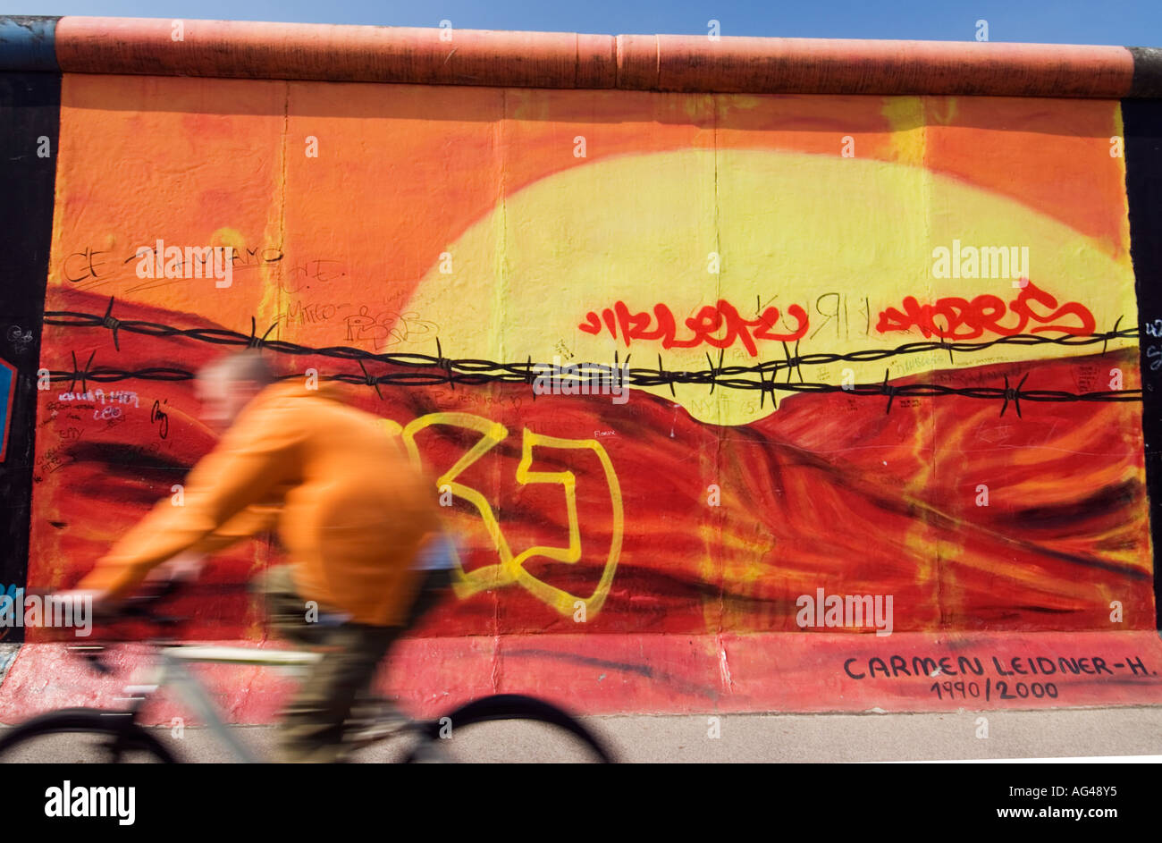 Colourful murals painted on Berlin Wall at East Side Gallery in Berlin ...