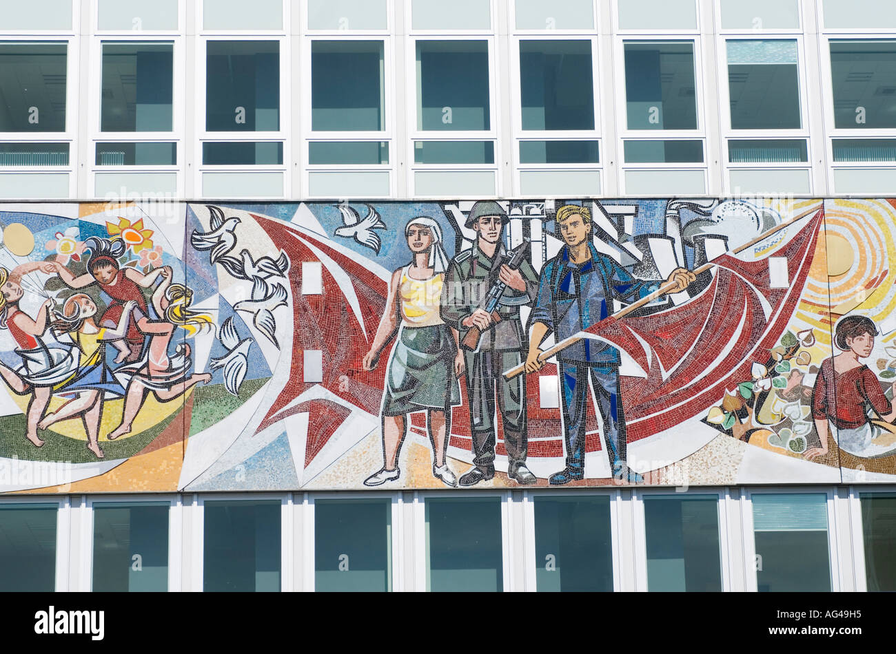 East German office "Haus des Lehrers" building with communist murals on ...