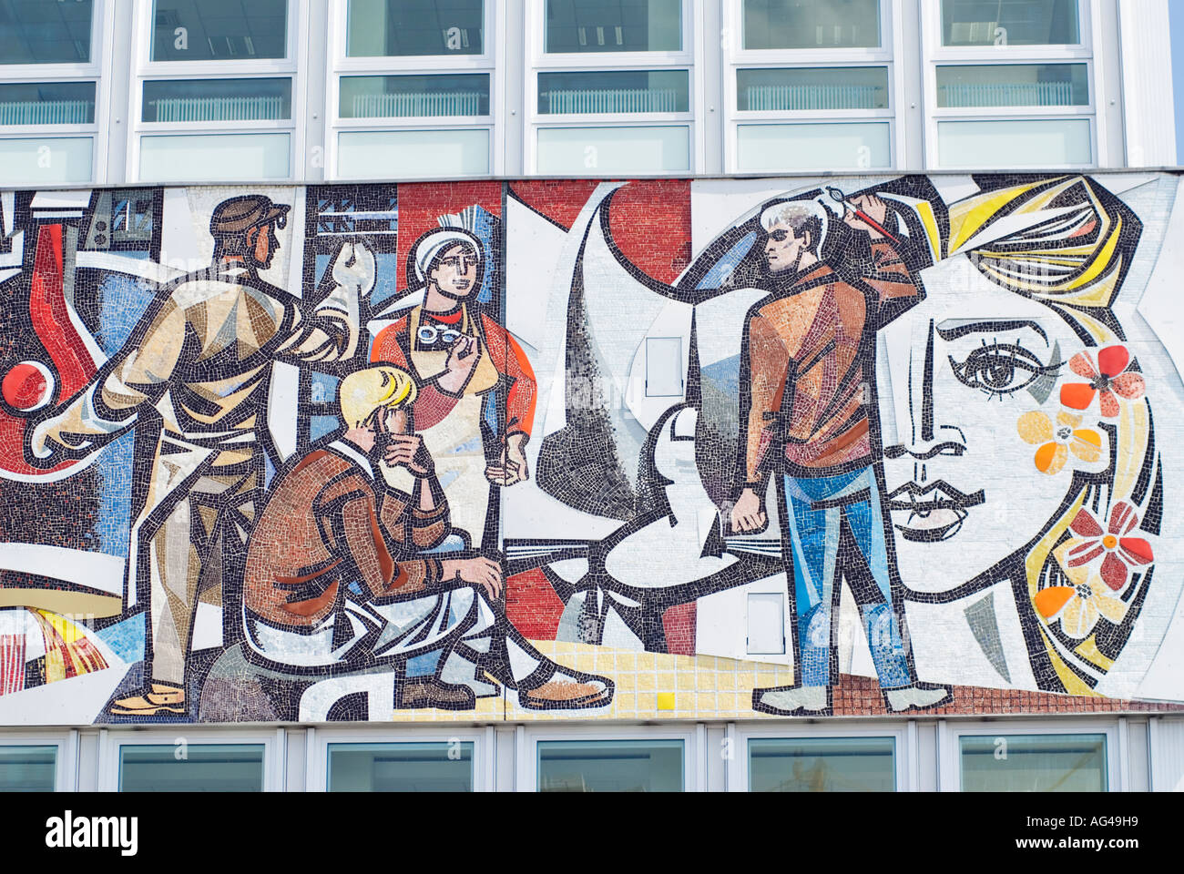 East German office "Haus des Lehrers" building with communist murals on ...