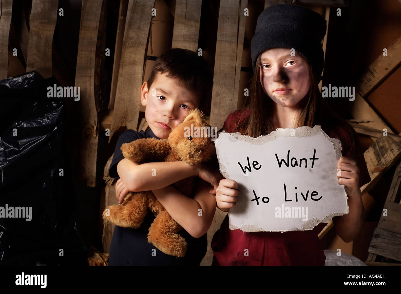 Impoverished boy and girl Stock Photo - Alamy