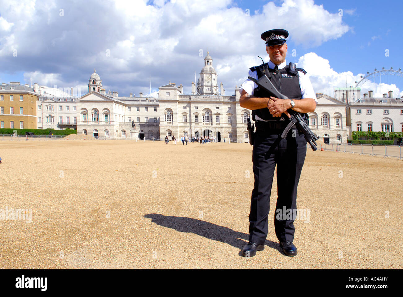Armed British London Met or Metropolitan police officer in uniform at ...