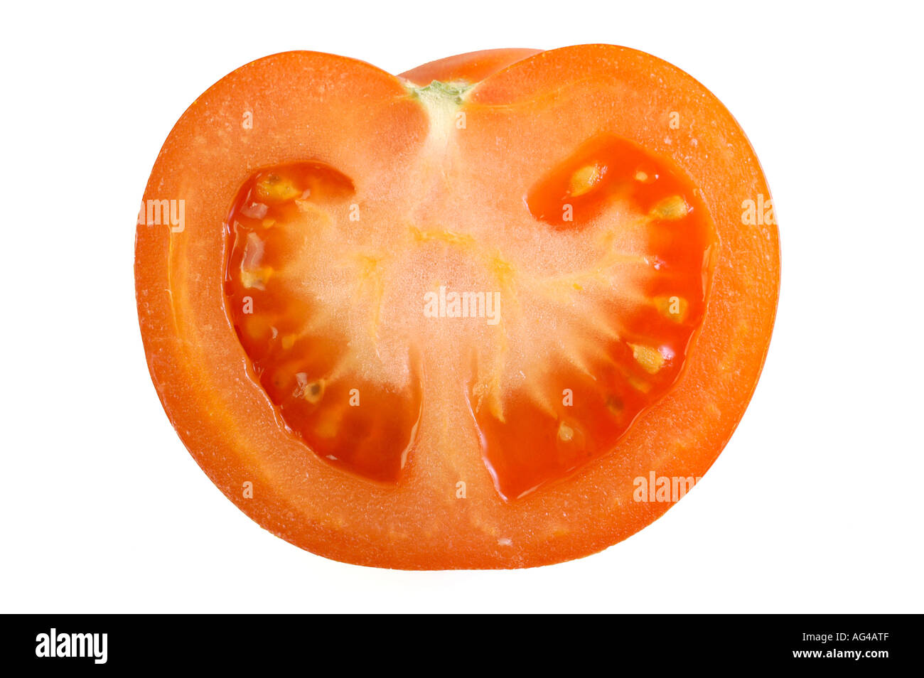 Tomato sliced in half Stock Photo - Alamy