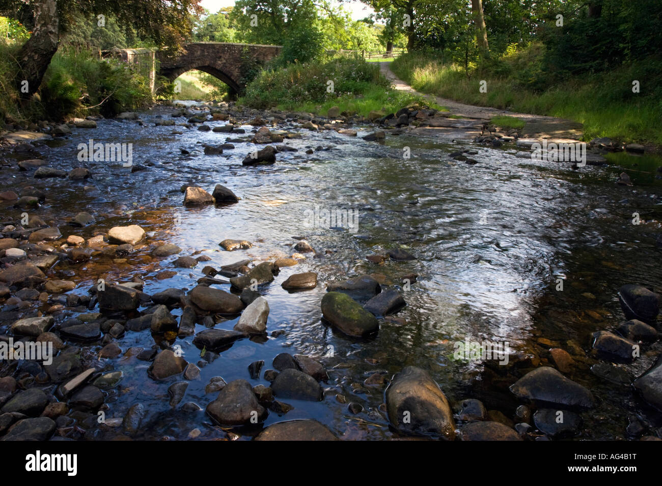 Traditonal stone bridge and Ford over Pendle Water near Barley Stock ...