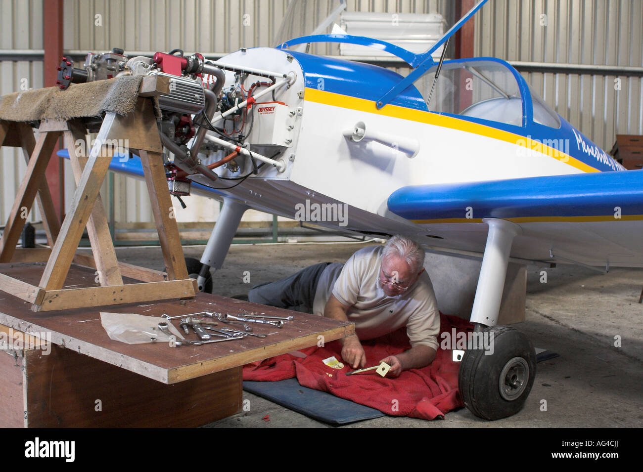 Aircraft maintenance in a hanger Stock Photo - Alamy