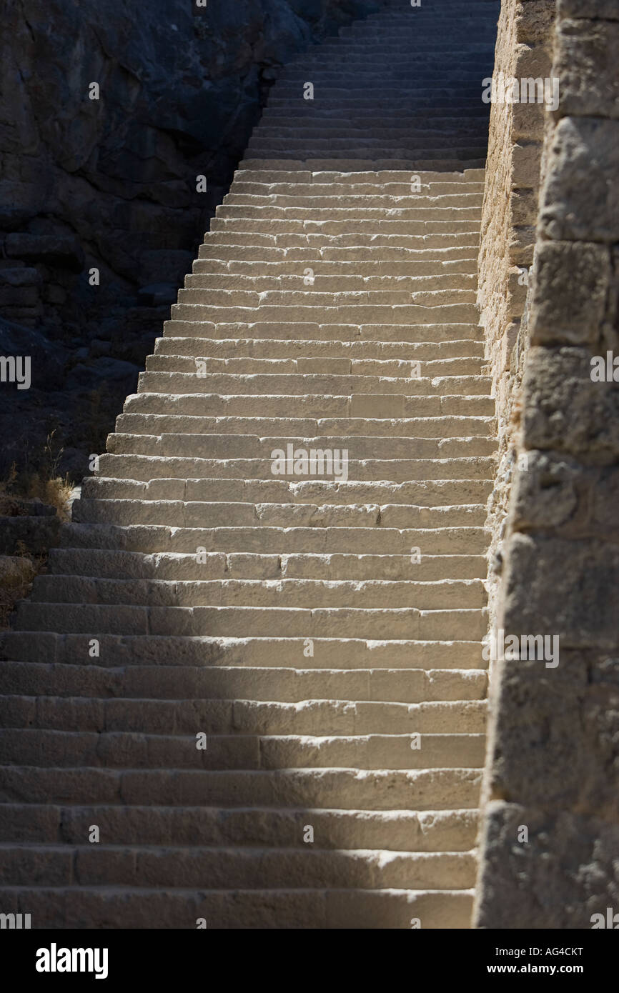 Steps leading to the acropolis on top of the hill at Lindos on the ...
