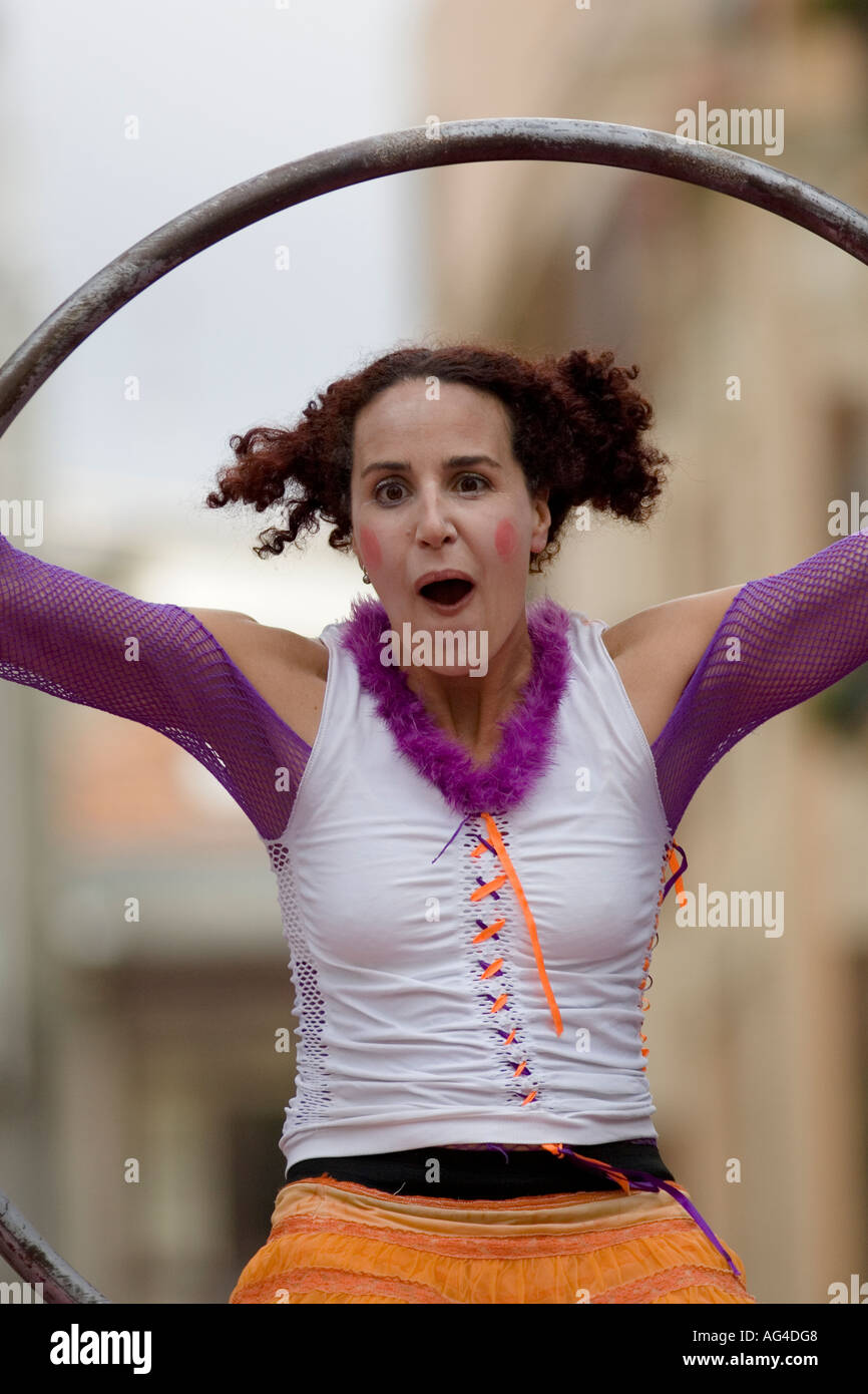 Female acrobat exclaims as she performs in Gran Via Bilbao Pais Vasco ...