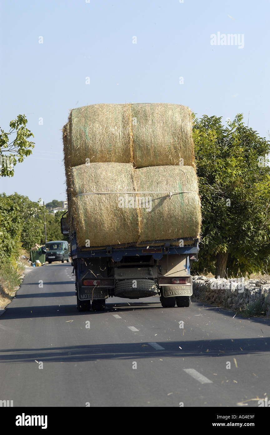 truck straw bales on a road in mallorca Stock Photo - Alamy