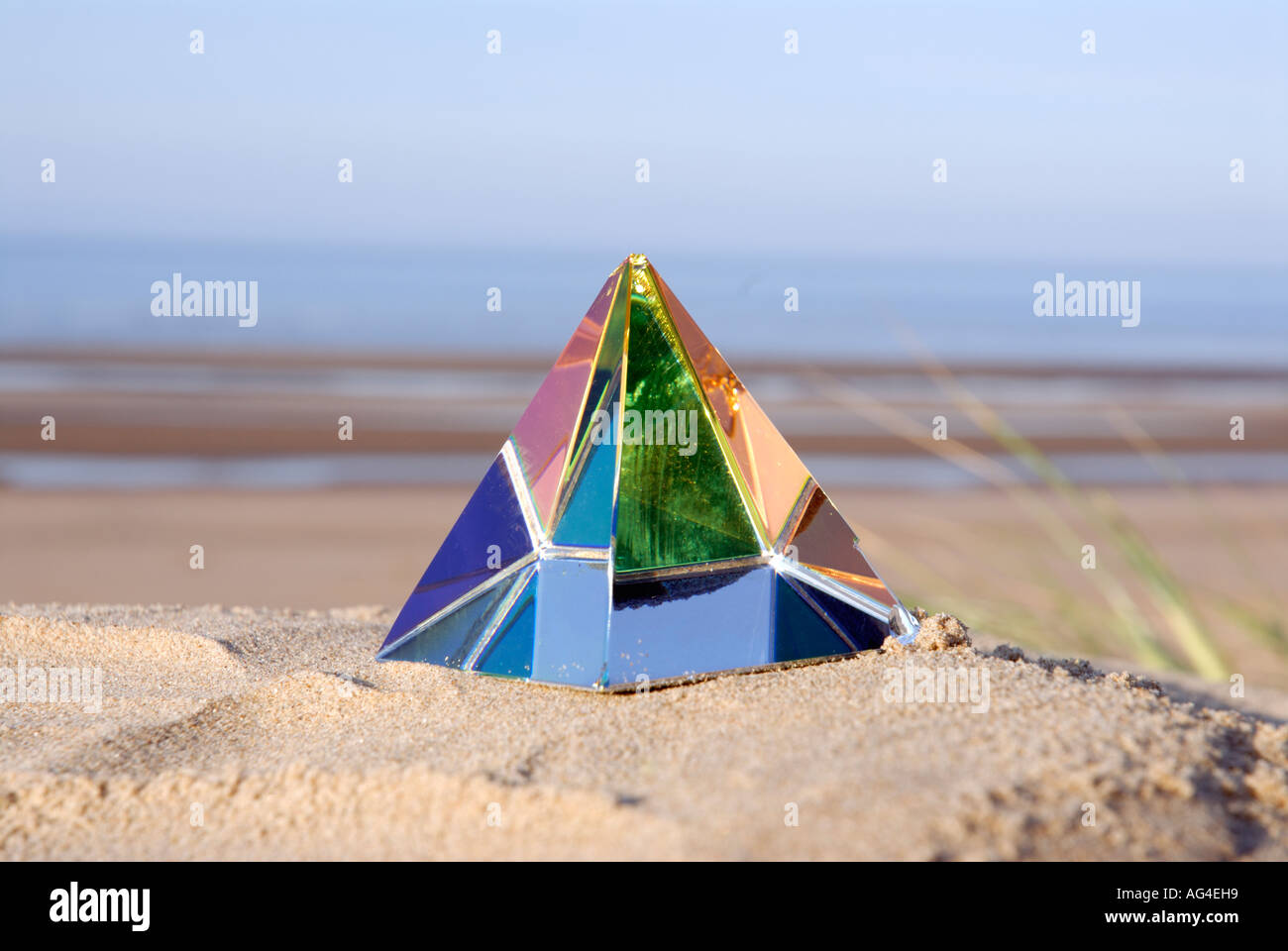 Glass pyramid on seashore beach Stock Photo - Alamy