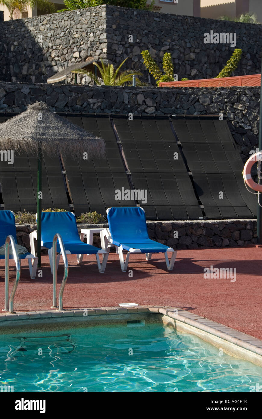 Solar heated swimming pool hi-res stock photography and images - Alamy
