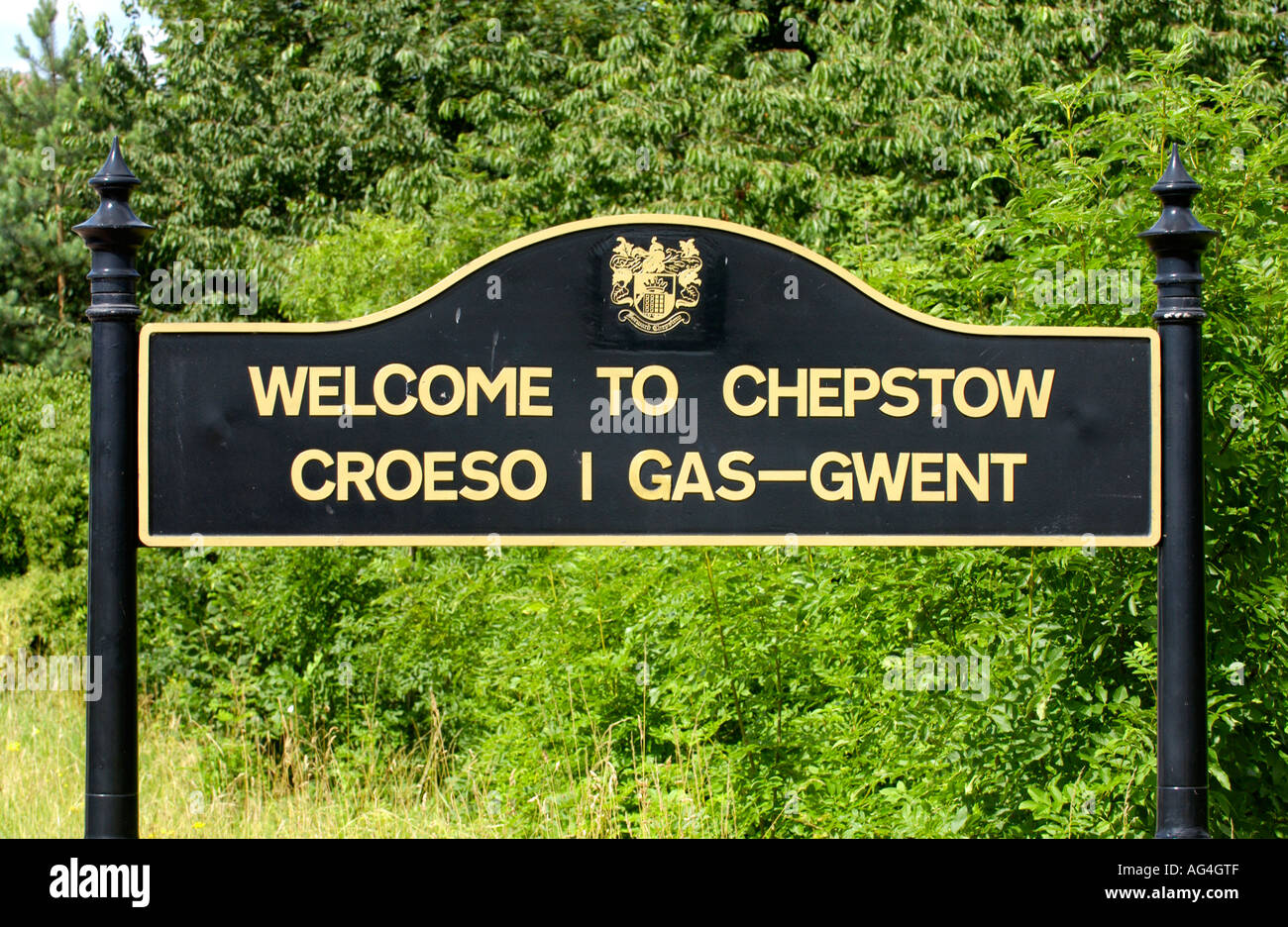 Bilingual English Welsh language WELCOME TO CHEPSTOW roadside sign ...