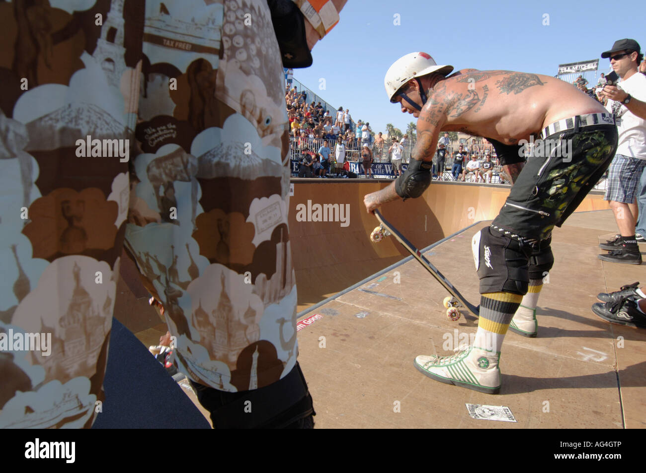 skate boarding action on a swimming pool like ramp California Stock ...