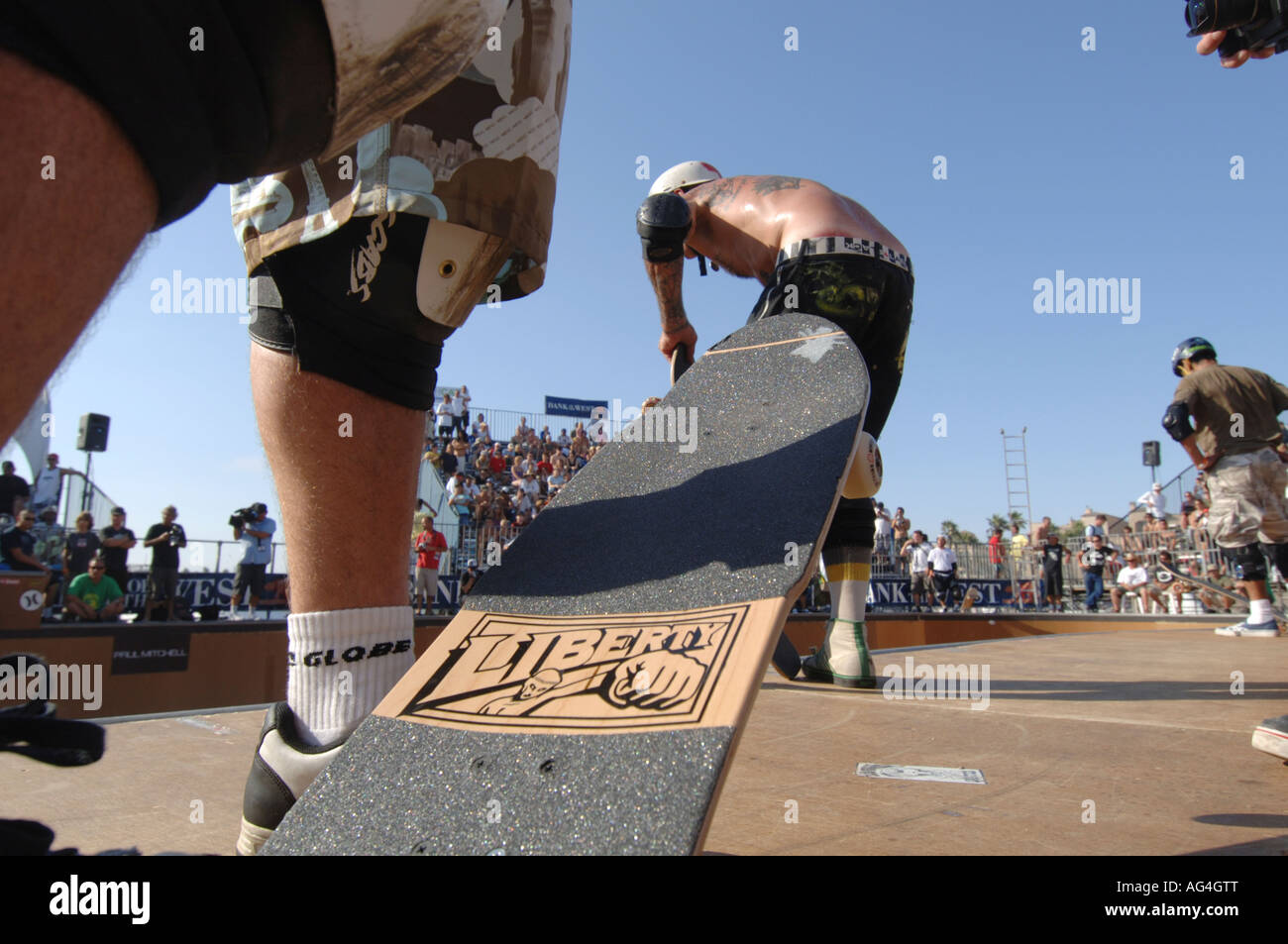 skate boarding action on a swimming pool like ramp California Stock ...