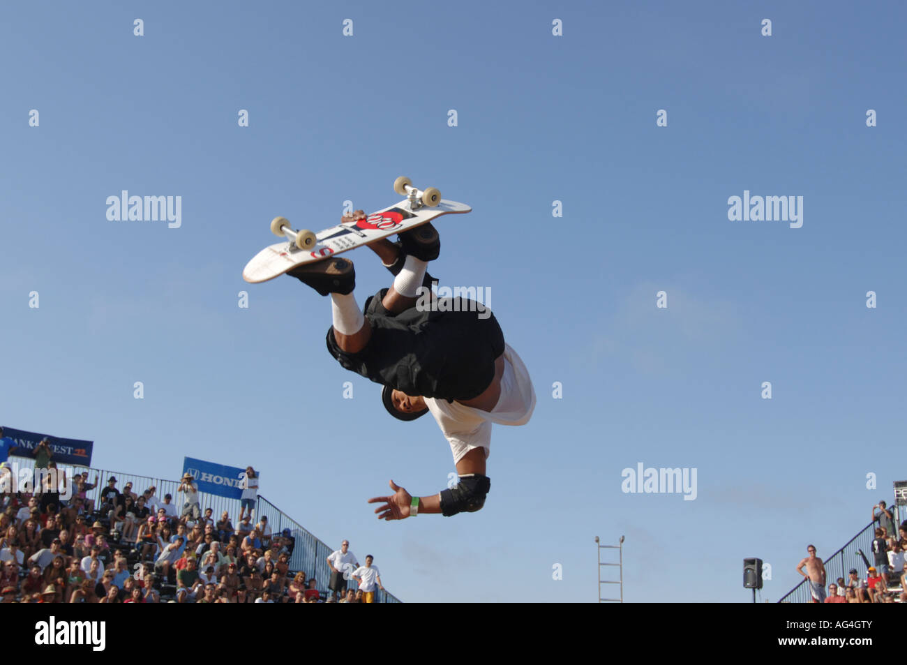 skate boarding action on a swimming pool like ramp California Stock ...