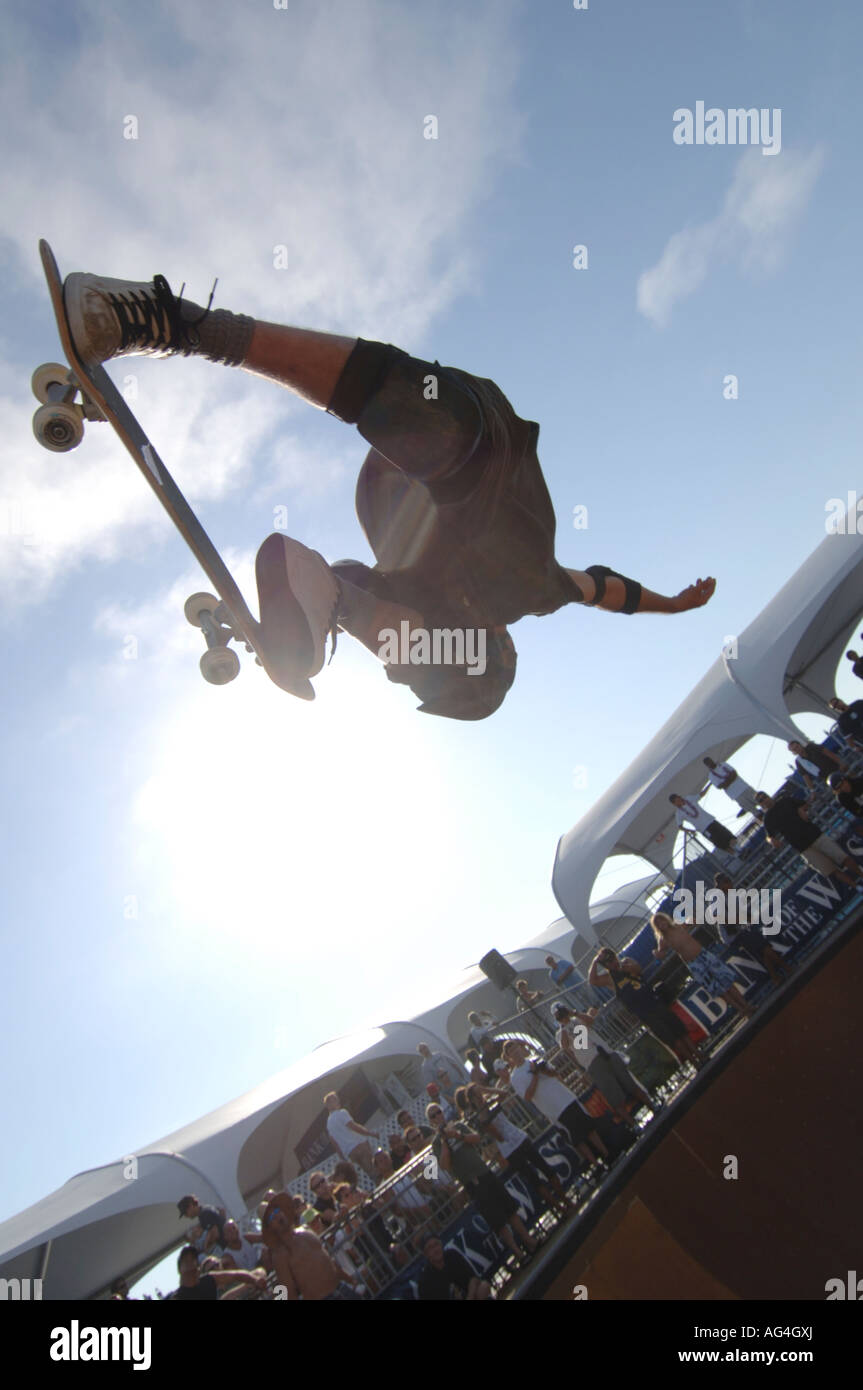 skate boarding action on a swimming pool like ramp California Stock ...