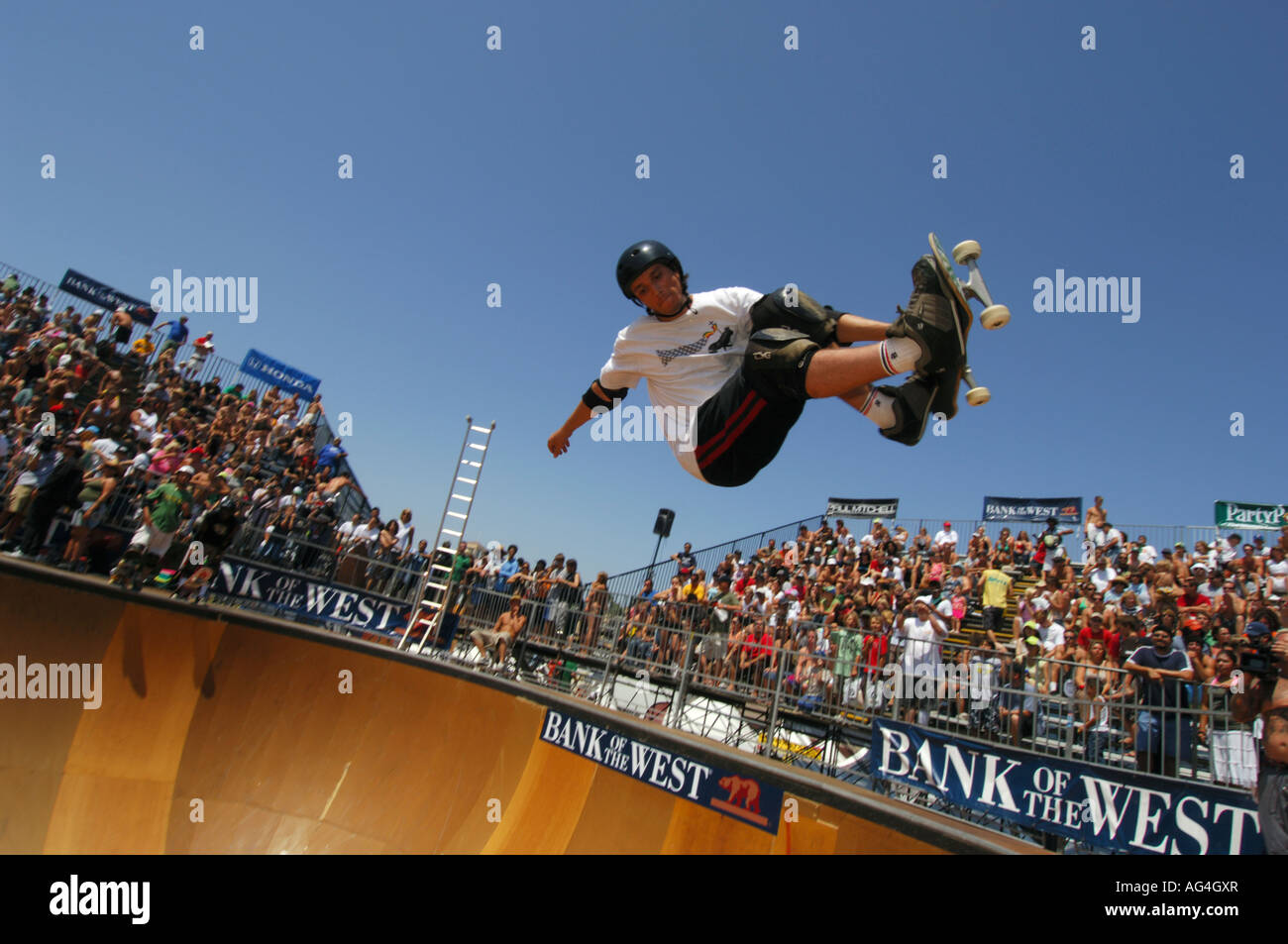 skate boarding action on a swimming pool like ramp California Stock ...