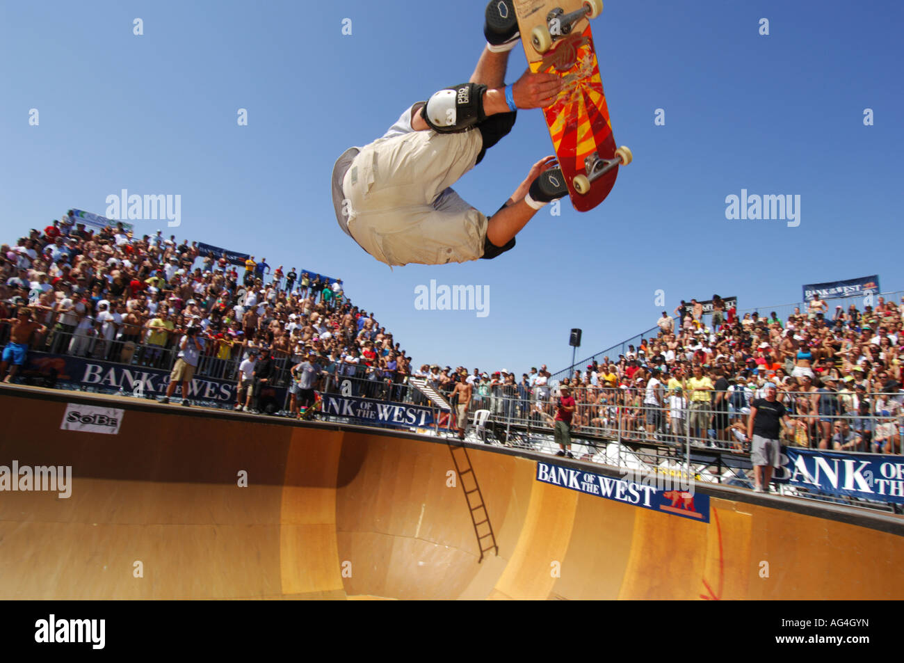skate boarding action on a swimming pool like ramp California Stock ...