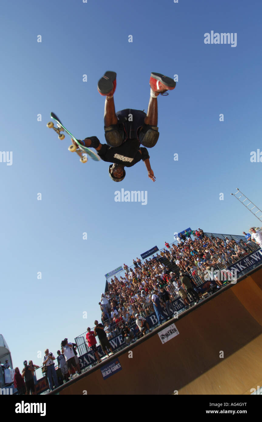 skate boarding action on a swimming pool like ramp California Stock ...