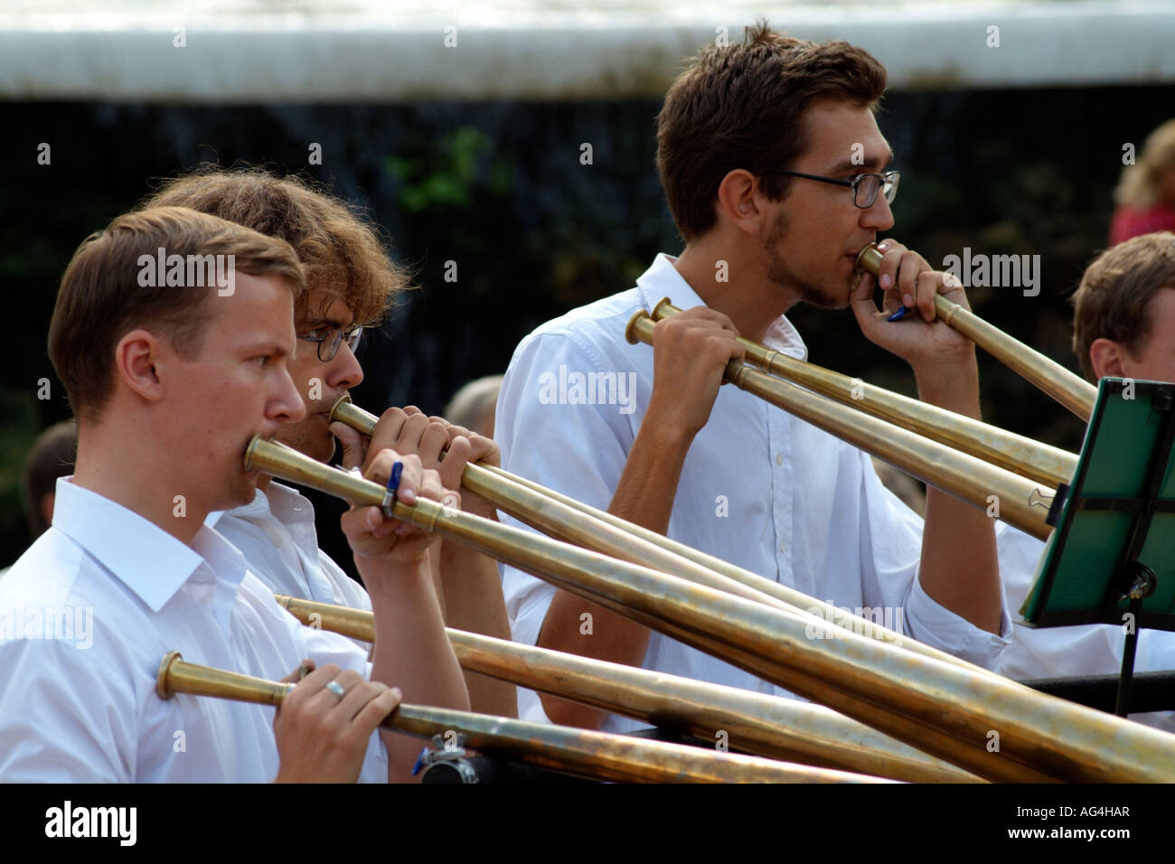 Blowing playing brass instruments hi-res stock photography and images ...