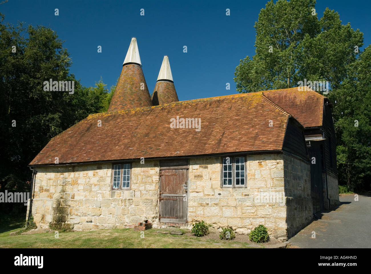 Twin roundel oast house of stone and brick construction at Borders ...