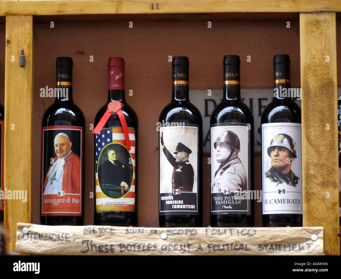 5 "not political" wine bottles in a window display in Italy - 3 labels ...