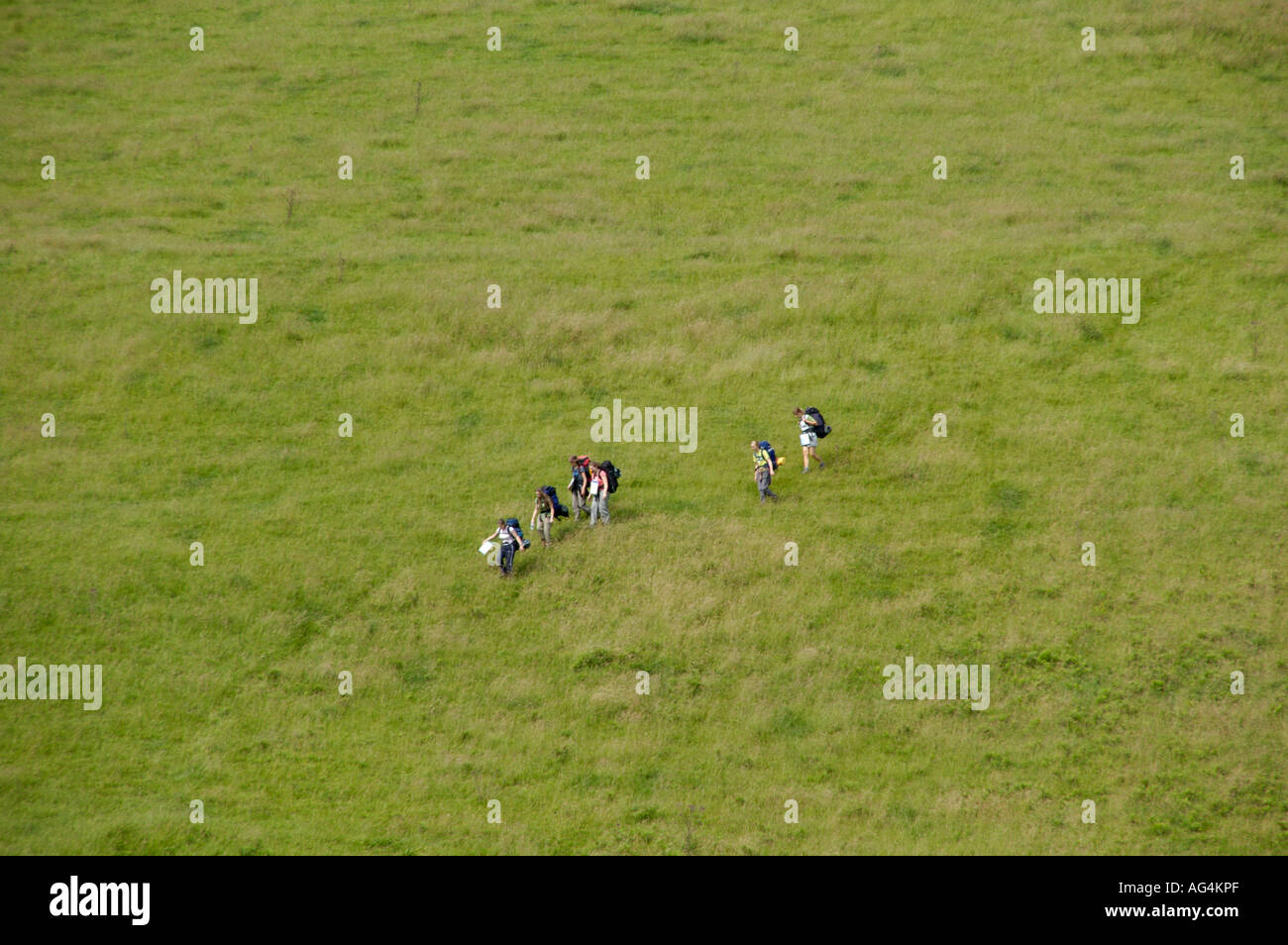 Guided walking group crossing open land on Taff Trail near Storey Arms ...