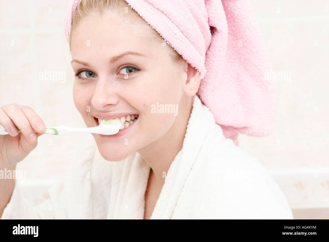 Young woman is brushing teeth with toothbrush Stock Photo - Alamy
