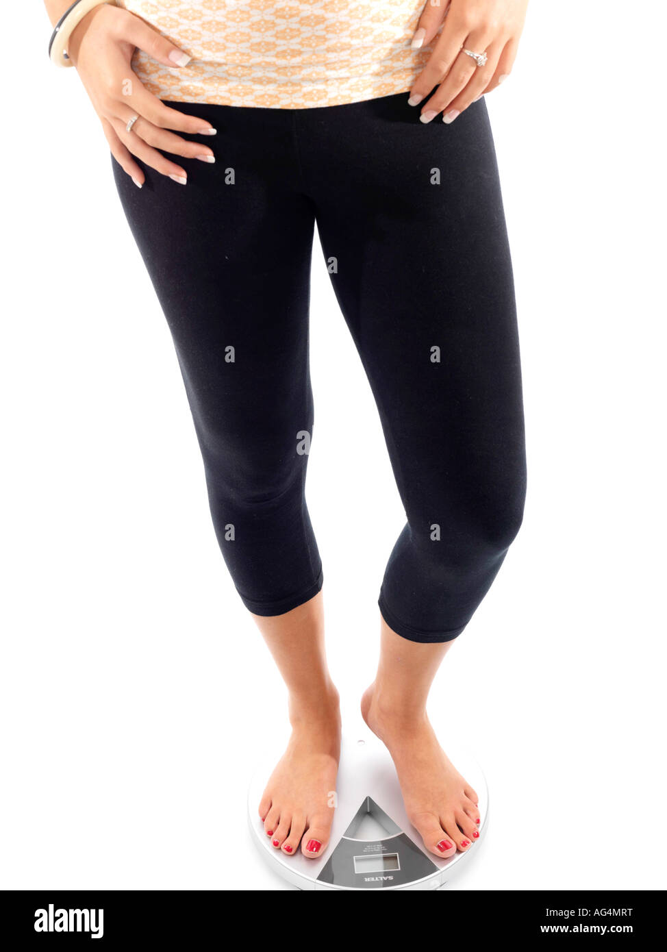 Woman using Scales Model Released Stock Photo - Alamy