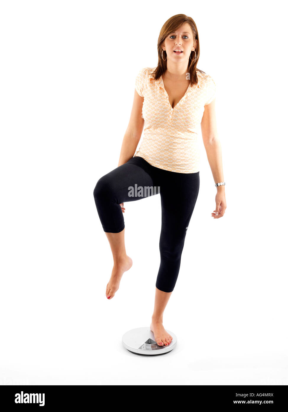 Woman using Scales Model Released Stock Photo - Alamy