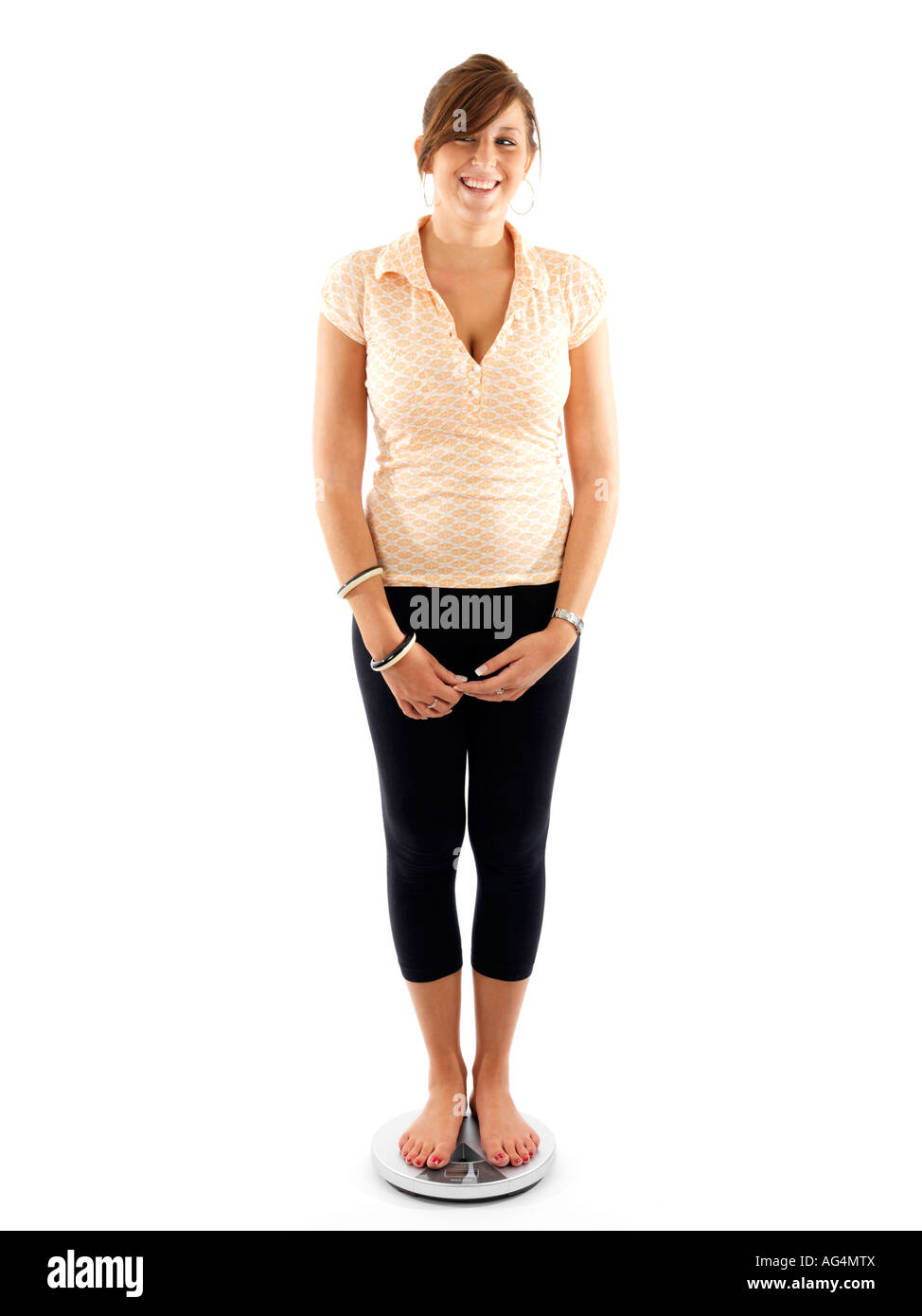 Woman using Scales Model Released Stock Photo - Alamy
