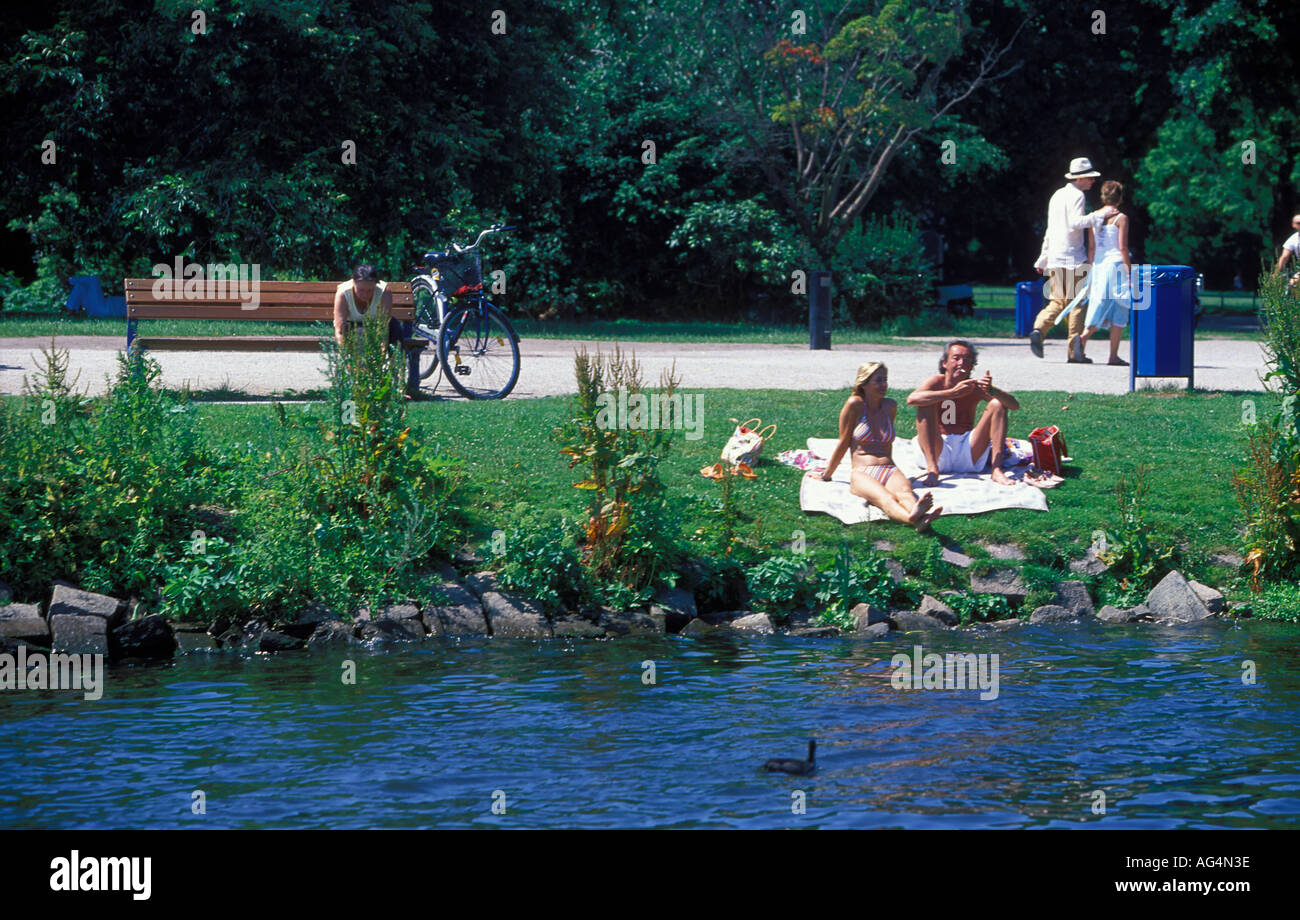 Germany Hamburg people at the Alster park located by the Aussenalster ...