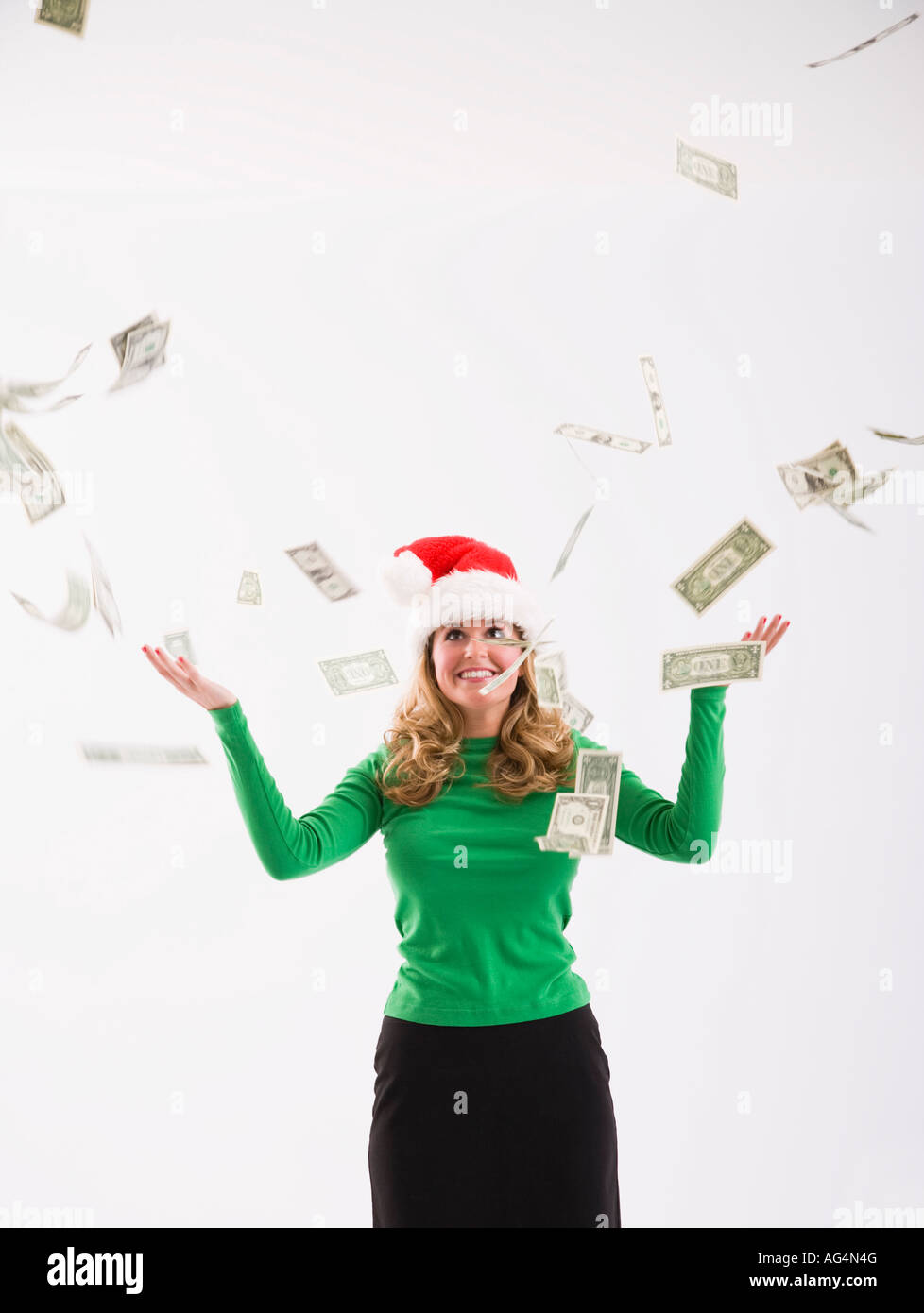 Woman throwing money in the air hi-res stock photography and images - Alamy